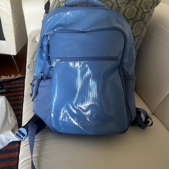 Calpak | Bags | Calpak Blue Glossy Backpack With Adjustable Straps ...